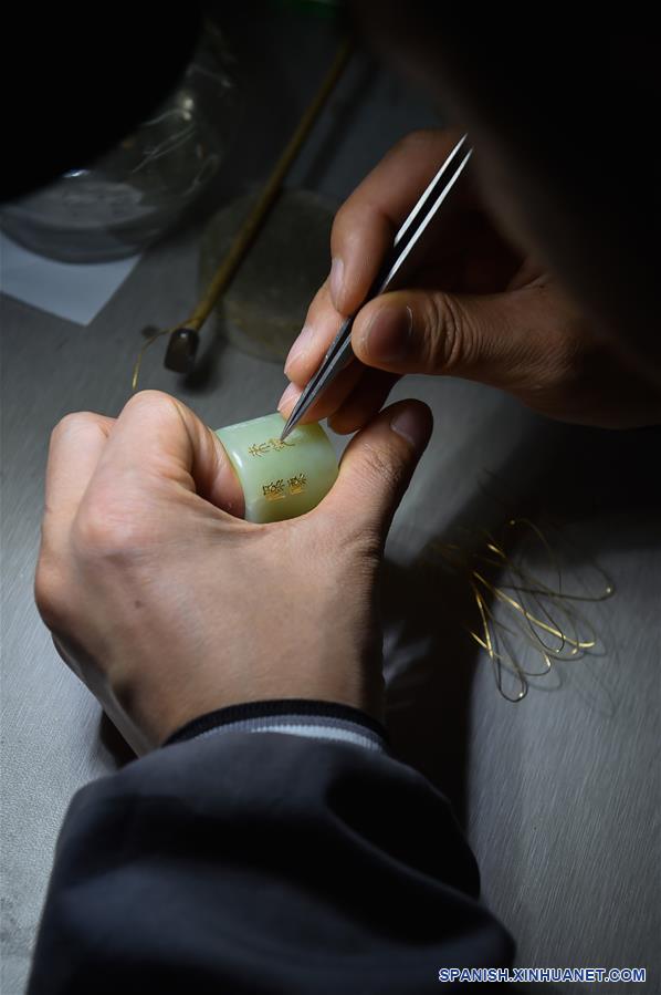 Guo Weijun, un reconocido artesano de la talla de jade con ...